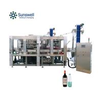 China 4 in 1 Glass PET Bottle Rinsing Filling Screw ROPP Sealing Machine 20000BPH for sale