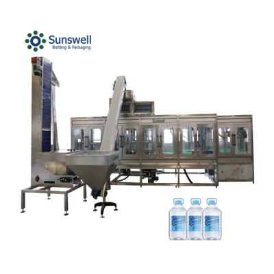 China Mineral Water Bottle Filling Machine 3 in 1 Rinsing Filling Capping 500BPH 12L for sale