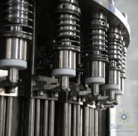 China RCGF Automatic Tea Filling Machine 3-in-1 System with 95°C Hot Filling Capacity for 4000-24000 Bottles/Hour for sale