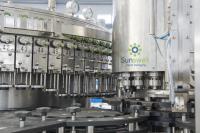 China Automatic Beer Washing Filling Capping Machine - 3000 Bottles/Hour Capacity with 18 Washing & 6 Capping Heads for sale
