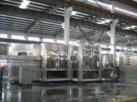 China 3-in-1 Carbonated Filling Machine for PET Bottles - 24 Rinsing Heads, 5000 BPH Capacity, 3.25KW Power for sale