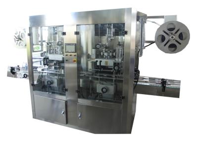 China Fully Automatic High Speed Double Heads PVC Film Sleeve Labeling Machine for Plastic Bottle for sale