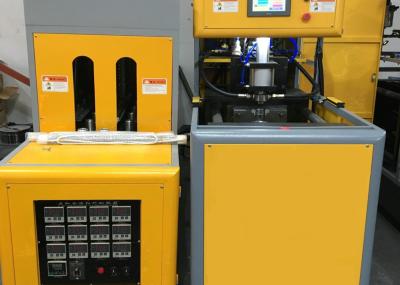 China Semi - Automatic Blow Molding Machine 1000BPH - 1200BPH For 500ml PET Bottle for sale