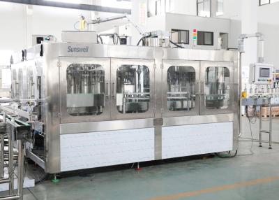 China 10000 BPH 1 Liter Glass Bottle Whiskey Vodka Filling Machine with 32-32-10 Heads and 5.5kW Motor for sale