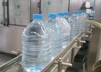 China 3 in 1 Mineral Water Jar Rinsing Filling Capping Machine 1200BPH 5L for sale