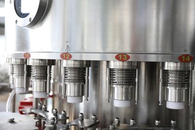 China 3-in-1 Automatic Carbonated Beverage Rotary Filling Machine - 18 Heads, 3200 BPH Capacity for Glass Bottles for sale