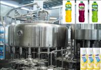 China 4000BPH Automatic Rotary Juice Filling Machine for Plastic Bottles for sale