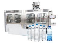 China PET Bottle Pure Water Filling Machine 15000BPH 3-in-1 Gravity Filling Line for sale
