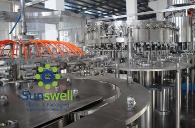 China Automated 3-in-1 Carbonated Beverage Bottling Machine DCGF24-32-8 - 9,000 BPH Capacity with 32 Filling Heads for sale
