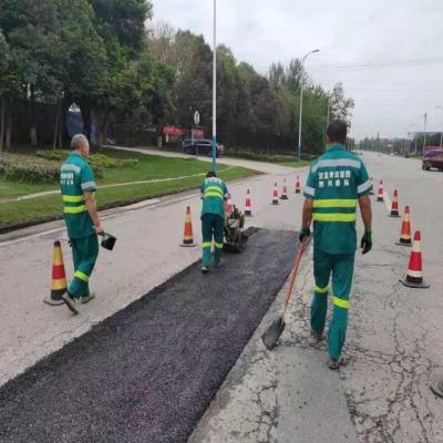 China 20kgs Bag Driveway Sealcoating And Crack Filling Fix Large Cracks In Asphalt Driveway for sale
