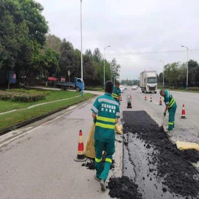 China Instant Repairs All Weather Cold Mix Asphalt Pot Hole Filler For Pavement Potholes for sale