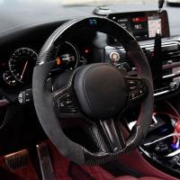 China Jaguar Series Carbon Fiber Steering Wheel with 1-Year Warranty and Universal Fitment for Performance Vehicles for sale