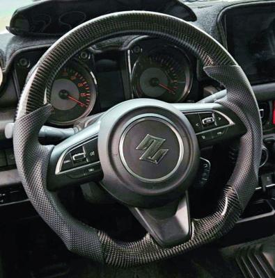 China Suzuki Series Black Carbon Fiber Steering Wheel with Enhanced Grip - Standard Size, 1-Year Warranty for Heavy Duty Vehicles for sale