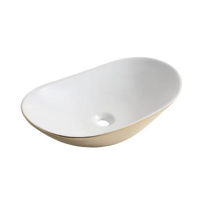 China Boat Top Quality Shape Bathroom Sink Wholesale Price Ceramic Oval Wash Basin Above Counter Basin for sale