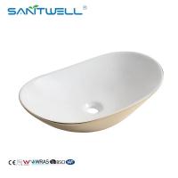 China Boat Top Quality Shape Bathroom Sink Wholesale Price Ceramic Oval Wash Basin Above Counter Basin for sale