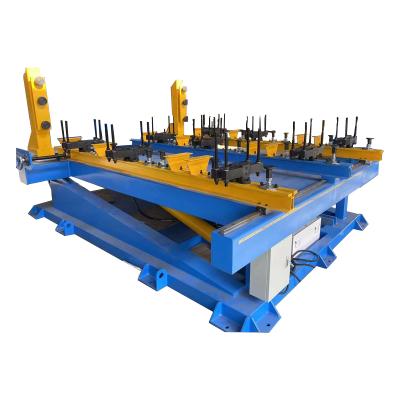 China 10-Ton Capacity Hydraulic Core Assembly Table with 90° Tilting System and Adjustable Column Distance for sale