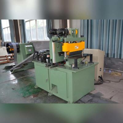 China DHJ300 Automatic Core Cutting Machine with 180m/min Speed for 0.23-0.35mm Silicon Steel and PLC Control for sale