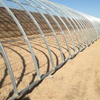 China Agricultural Solar Greenhouses with Ventilation System and Customizable Arch Space for sale