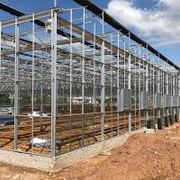 China Large Size Transparent Glass Greenhouse Super Strong Resistance and Hydroponics System for sale