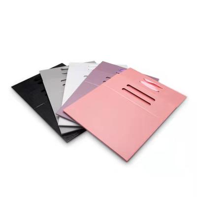 China Folding Rigid Cardboard Paper Clothing  Shoes  Gift Box With Ribbon Handle for sale