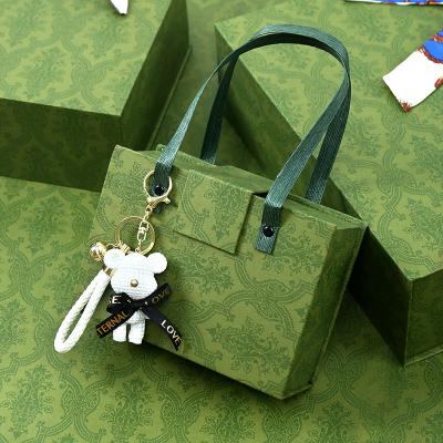 China Luxury 250gsm Cardboard Custom Paper Packaging Box With Handle for sale