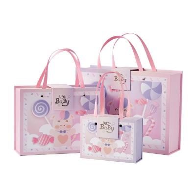 China Customized Clothing Folding Packaging Gift Box With Handle for sale