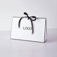 China Custom Logo Luxury Shopping Bags Gift Cardboard Paper Packaging Bag With Ribbon Bow for sale