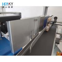 China Desktop Round Bottle Labeling Machine with Transparent Label Sensor and Touch Screen Operation at 55 Bottle per minute for sale