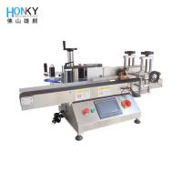 China Desktop Round Bottle Labeling Machine with Transparent Label Sensor and Touch Screen Operation at 55 Bottle per minute for sale