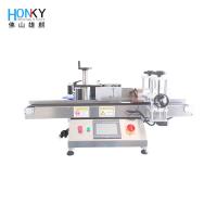 China Desktop Round Bottle Labeling Machine with Transparent Label Sensor and Touch Screen Operation at 55 Bottle per minute for sale