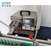 China Desktop Vial Filling Machine with Ceramic Pump for 60-80 PCS/MIN and Compact Design for Small Batch Filling for sale