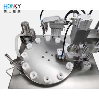 China 2000 BPH GMP Certified Desktop Filling and Capping Machine with Ceramic Pump for sale