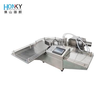 China 30ml Round Bottle Table Top Liquid Filling Machine Semi Automatic with Ceramic Piston Pump and GMP Certification for sale