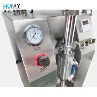 China Desktop Type 2ml Ceramic Piston Pump Paste Filling Machine for Syringe Filling and Packing for sale