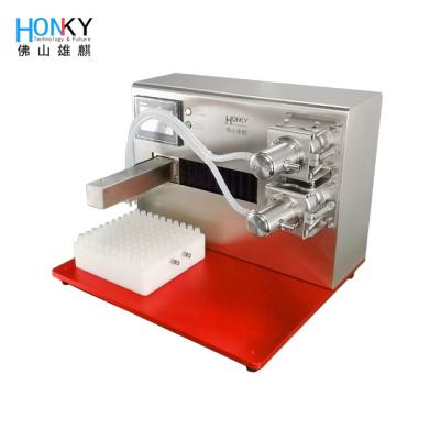 China Desktop Type Automatic 2ml Perfume Sample Tube Filling Machine With Ceramic Piston Pump For 80 BPm Efficiency for sale