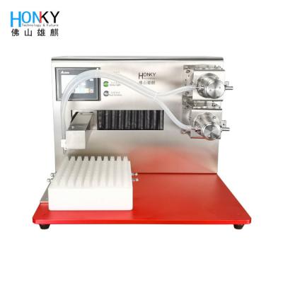 China Desktop Essential Oil Filling Machine 4800 BPH Double Head Ceramic Pump for sale