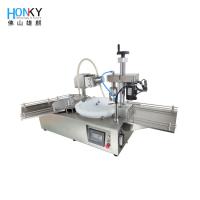 China 1500 BPH 0.6MPa Desktop Filling Machine With Ceramic Pump For Round Bottles for sale