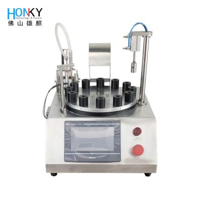 China Desktop 10ml Spray Bottle Filling Machine with Ceramic Pump and GMP Certification for sale