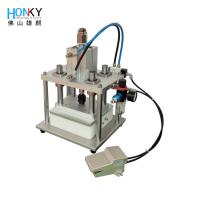 China Manual Pneumatic Capping Machine with 3600 BPH Speed, Pneumatic Control System, and Adjustable Gripper Head for Flat Cap Sealing for sale