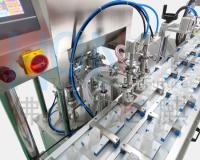 China Compact Automatic Filling Machine with Touchscreen Operation and PLC Control for Cosmetic Bottles – Stainless Steel Construction for sale