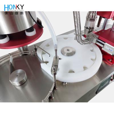 China Desktop Automatic 30-50ml Bottle Liquid Filling Machine with High Precision Ceramic Pump and Servo Motor Capping System for sale