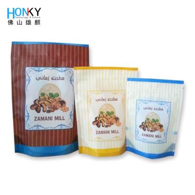 China Rotary Premade Pouch Packing Machine with 60 Bags/Min Speed Eight-Station Design and AC 220V Power Supply for sale
