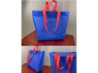 China Fully automatic non-woven cross-cutting and ironing bag-making machine with online handle attachings for sale