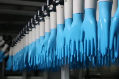 China Auto nitrile latex vinyl glove making machine with auto counter and stripping for sale