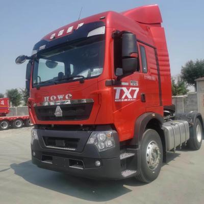 China Tubeless Tire Design 400hptx7 HOWO Tipper Trailer Truck with Carbon Steel Cargo Box for sale