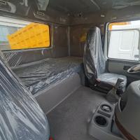 China Heavy Duty Sinotruck Tractor with Air Suspension Seat and Carbon Steel Cargo Box for sale