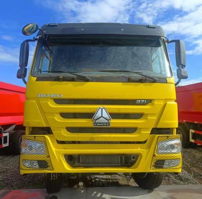 China 12100.000kg Chinese Used Car Transport HOWO Dump Truck with Carbon Steel Cargo Box for sale