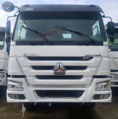China National Heavy Duty Truck Tractor HOWO 6X4 371HP Tractor with Carbon Steel Cargo Box for sale