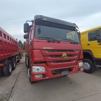 China Heavy-Duty Hauler Sinotruck Dump Truck with Carbon Steel Cargo Box and Tyres Vehicle for sale