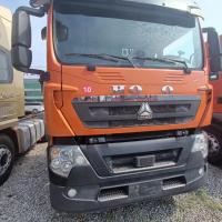 China Customized Package Size Used Sinotruk HOWO 6X4 Tractor Truck with 1000L Fuel Tank for sale